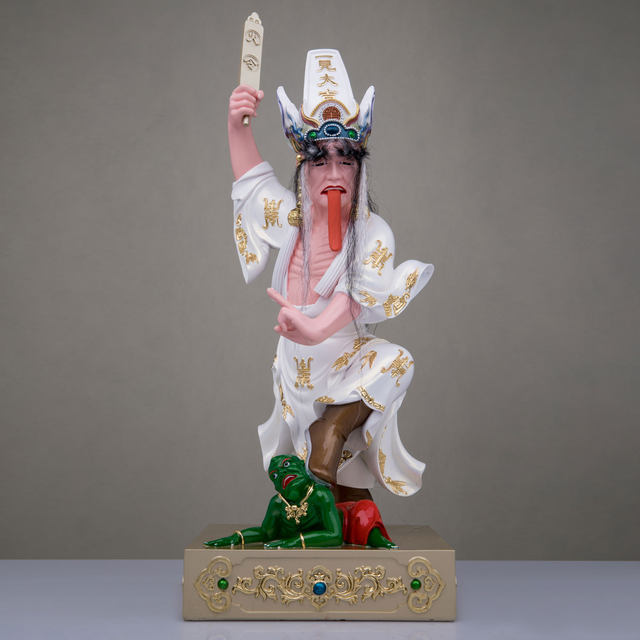 The ordinary resin black and white impermanent god statue in the ...
