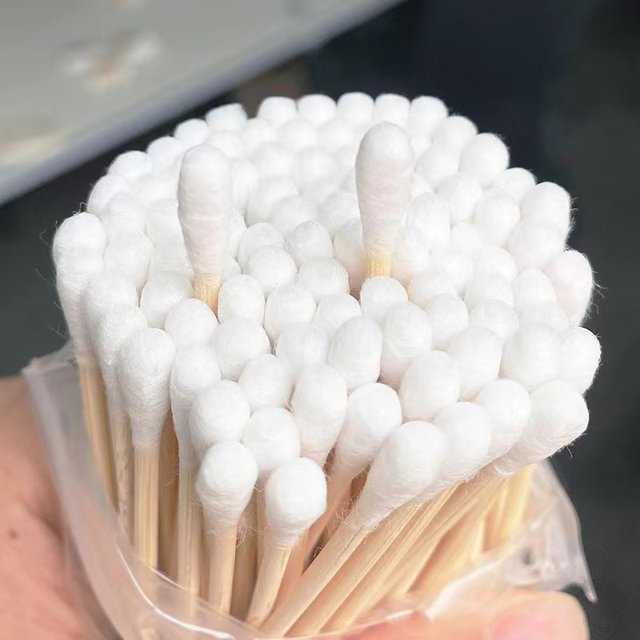 Two packets of cotton swabs in makeup tools