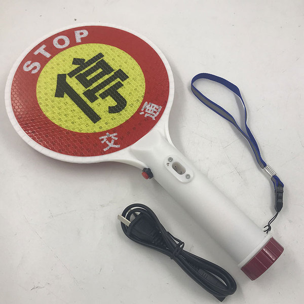 Traffic stop sign with hand holding slow to check and at intersection ...