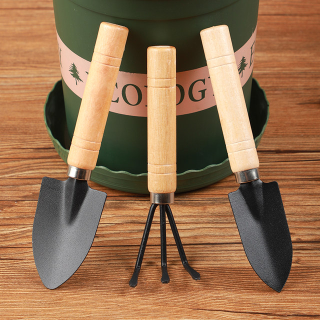 Potted small shovel planting flowers and raising flowers shovel loose ...