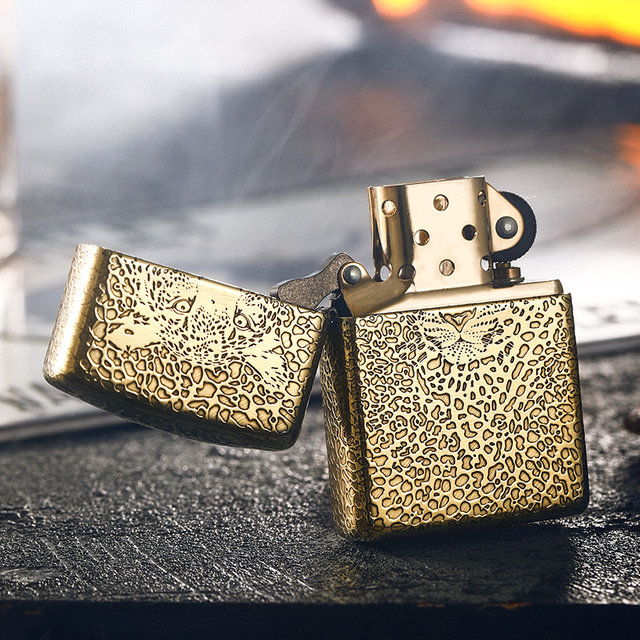 Genuine zippo lighter, brass armor machine surrounded by five-sided ...