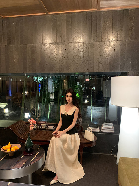 Muzili's Li Haijun collar black sleeveless top for women's spring and summer skirt two-piece suit