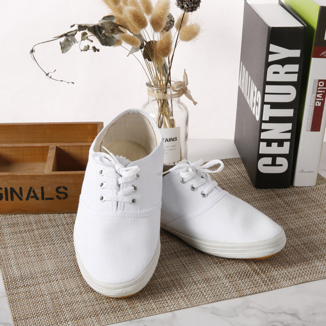 White men's shoes and women's shoes children's shoe canvas shoes white ...