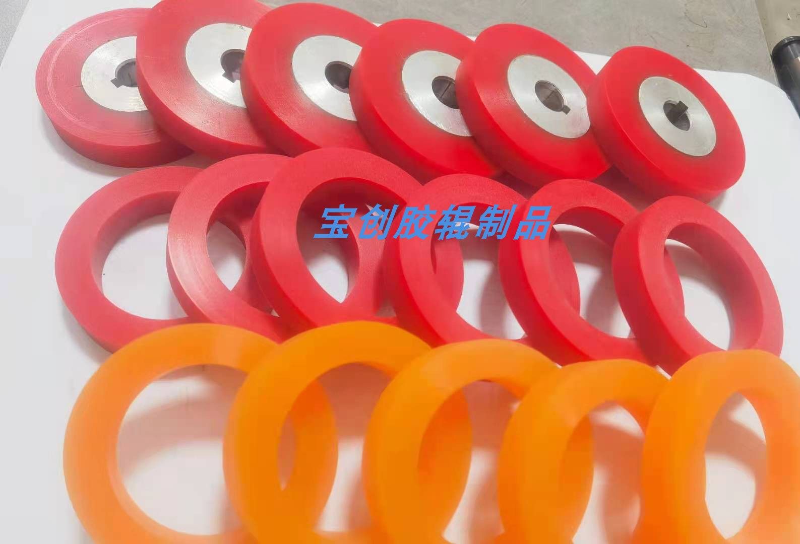 Bearing encapsulation, custom-made rubber wheels, rubber rollers ...