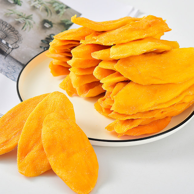 Large slices of dried mango, thick-cut preserved fruits, candied fruits ...