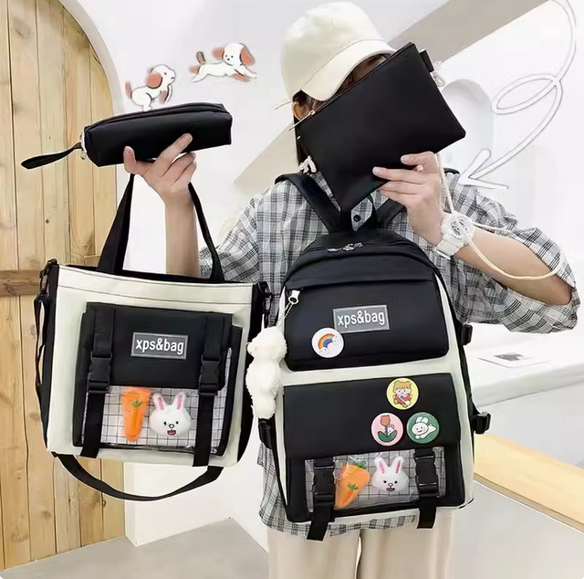 New four-piece set of middle school students backpack canvas backpack ...