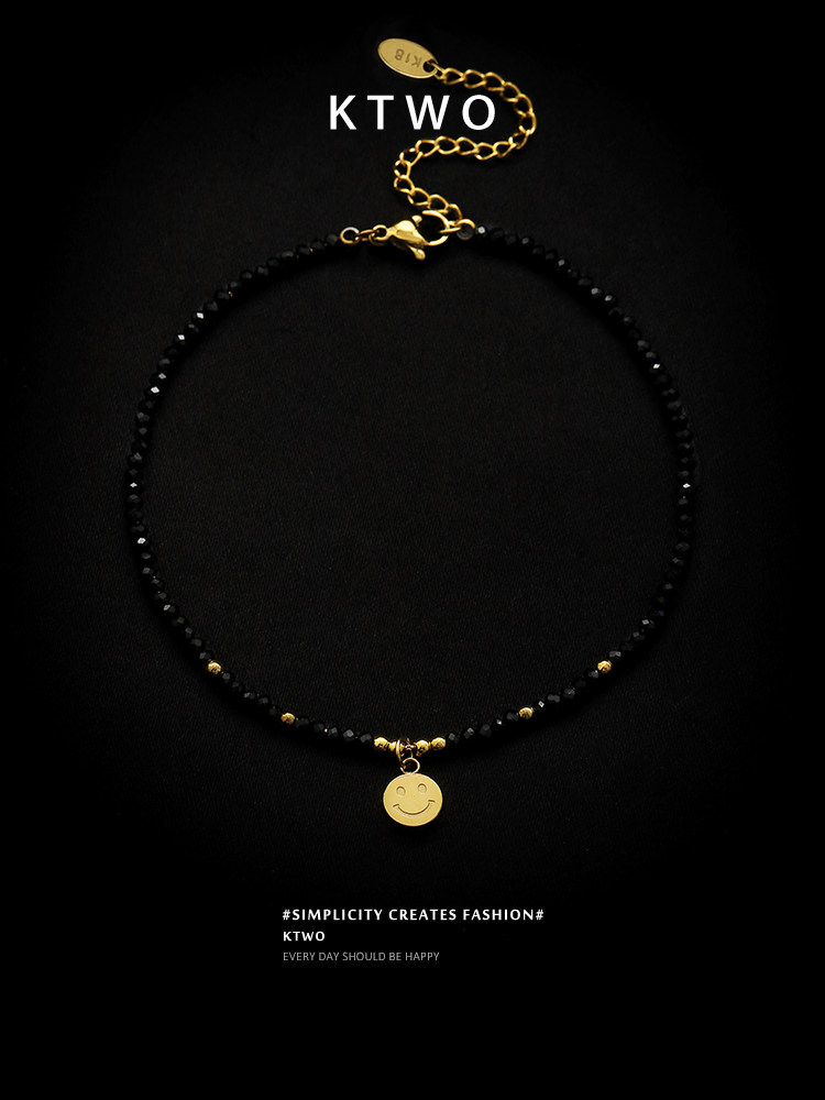 Ktwo Black Spinel Anklet - Smiling Face Design - Gold Plated
