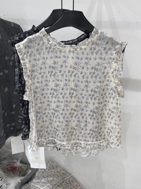 Floral button design sleeveless shirt for women in black ears 2025 ...