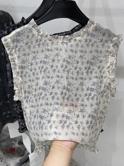 Floral button design sleeveless shirt for women in black ears 2025 ...