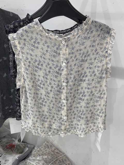 Floral button design sleeveless shirt for women in black ears 2025 ...