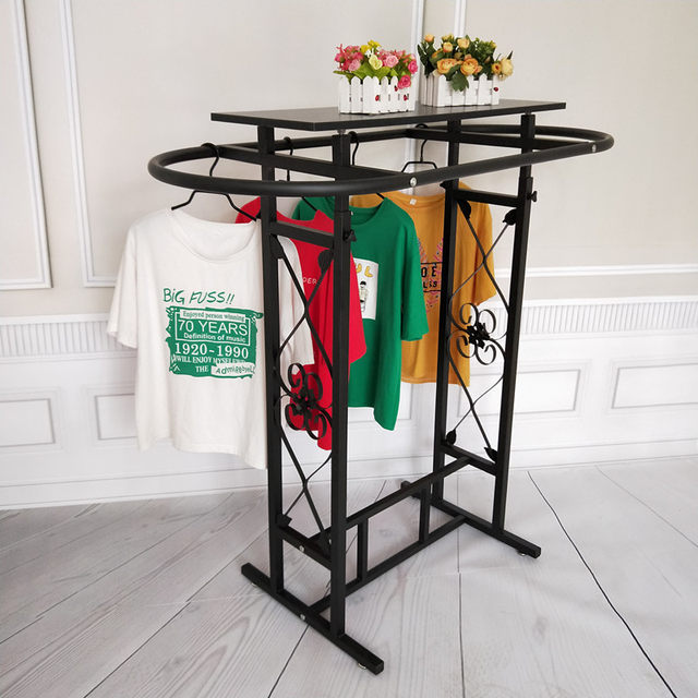 Wrought iron floor hanger clothing store hanging clothes rack parallel ...