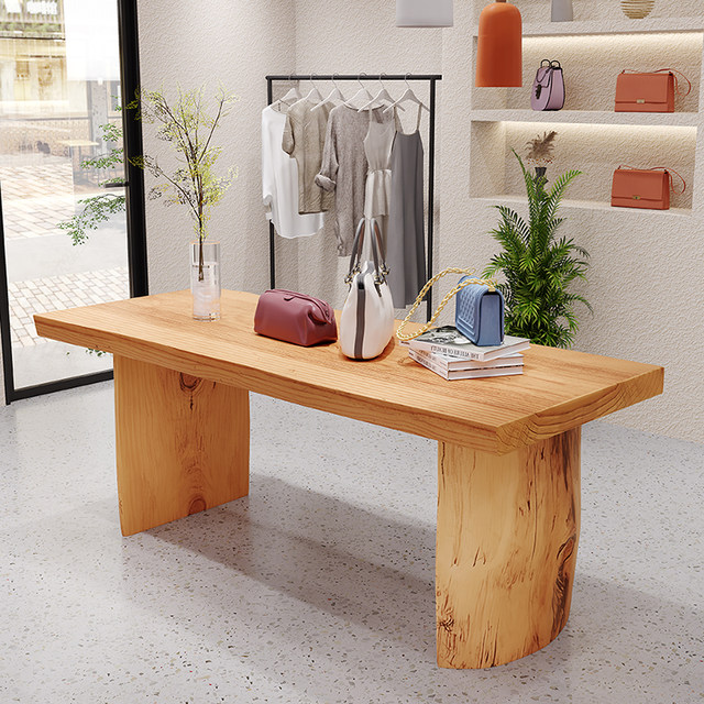 Light luxury log clothing display table island flow table solid wood ...