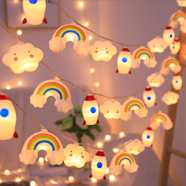 Clouds, stars, rainbow colored string lights, children's princess room ...