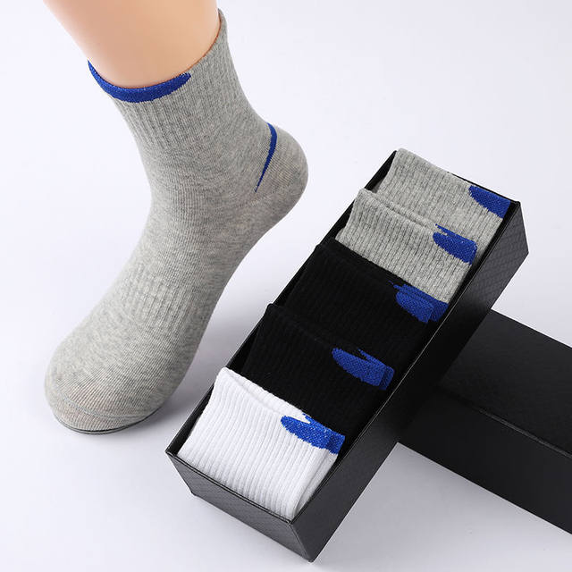 Men's mid-calf polyester socks spring and autumn sweat-absorbent and ...