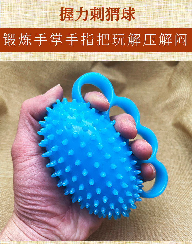 Hand pinching the ball - Ball with string is slightly smaller