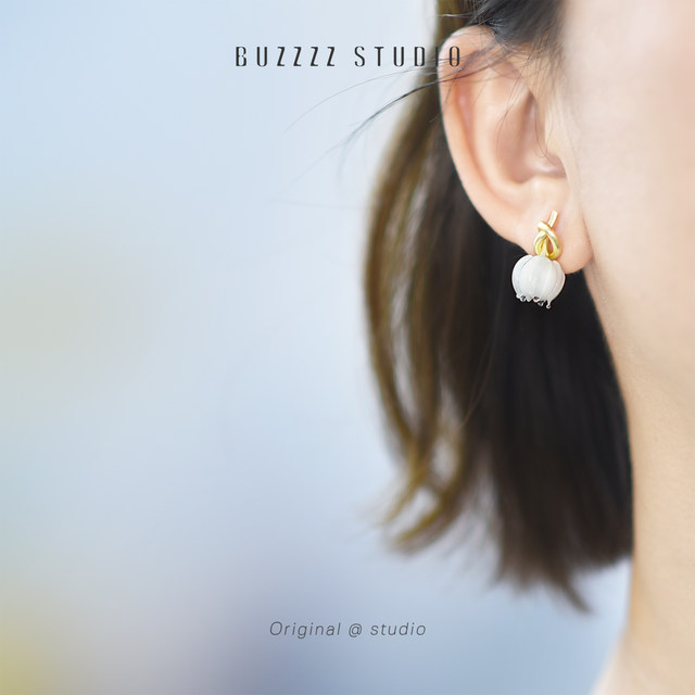 Original design entangled with glazed flowers and earrings, spring ...