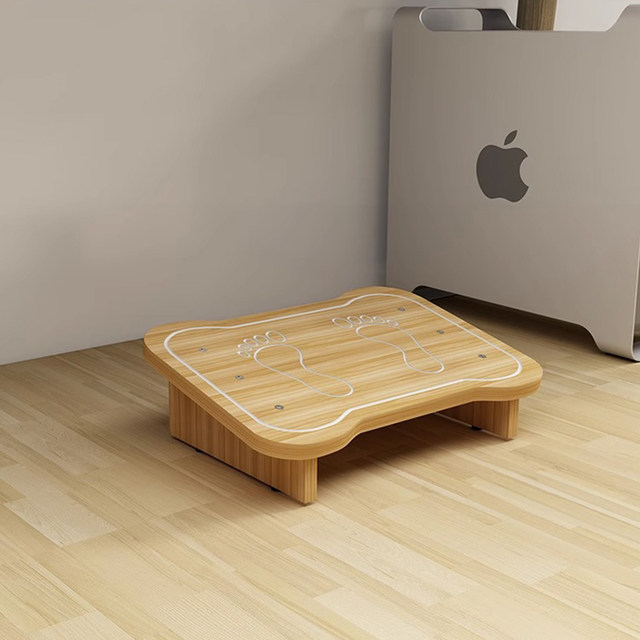 Office table under the foot artifact foot stool put the legs on the ...