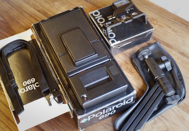 Poli came to Polaroid SLR690 machine emperor box and said that the full ...