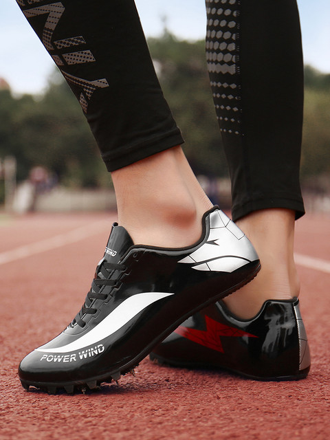 Track and field spike shoes, sprint, male sports students, middle and ...