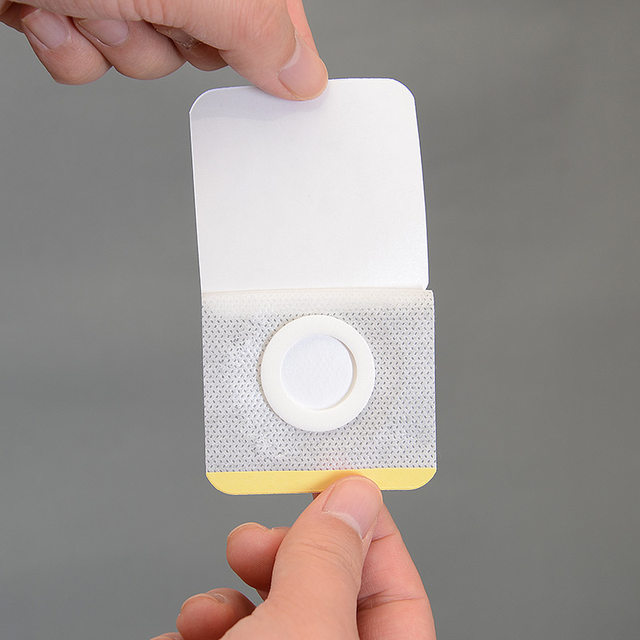 Non-woven hollow acupoint sticking breathable adhesive cloth navel ...