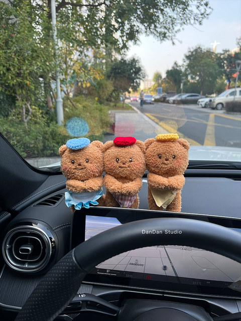 Cute bear cartoon car wiper turning to the light decoration car inside ...