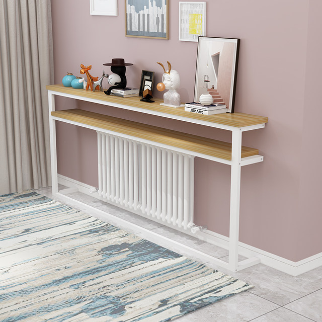 Living room sofa behind the heating shelf, the bedside bed, the sewing ...