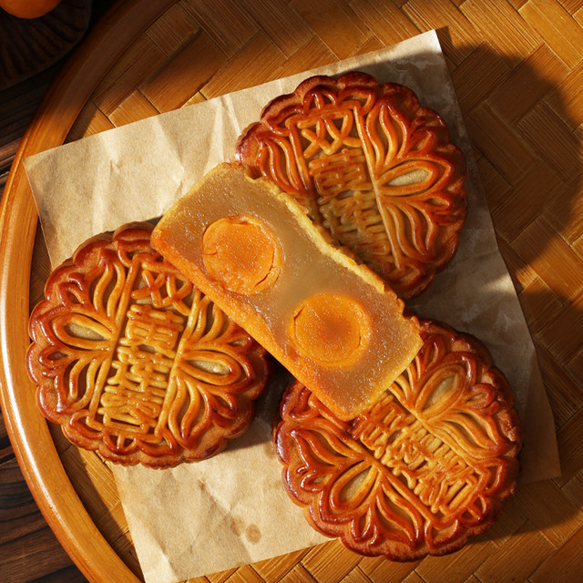 Cantonese-style mooncakes with egg yolk and lotus paste, authentic ...