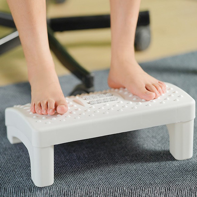 The office foot stool table under the foot of the foot to prevent the ...
