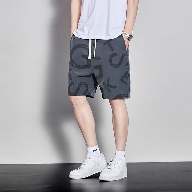Men's summer ice silk quick-drying trend ins printed five-point shorts ...