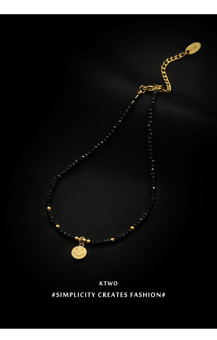 Ktwo Black Spinel Anklet - Smiling Face Design - Gold Plated