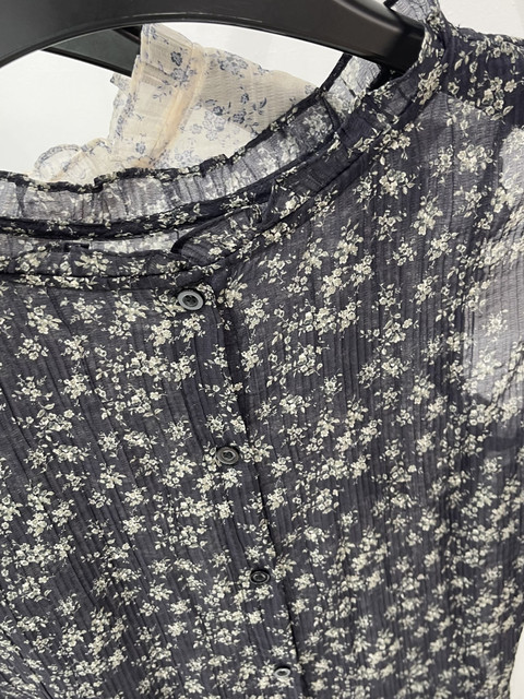 Floral button design sleeveless shirt for women in black ears 2025 ...