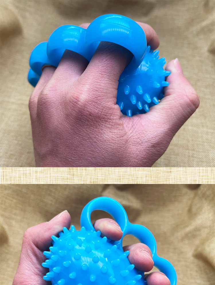 Hand pinching the ball - Ball with string is slightly smaller