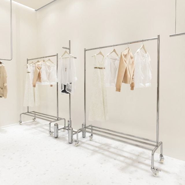 The clothing store display rack stainless steel band wheels silver ...