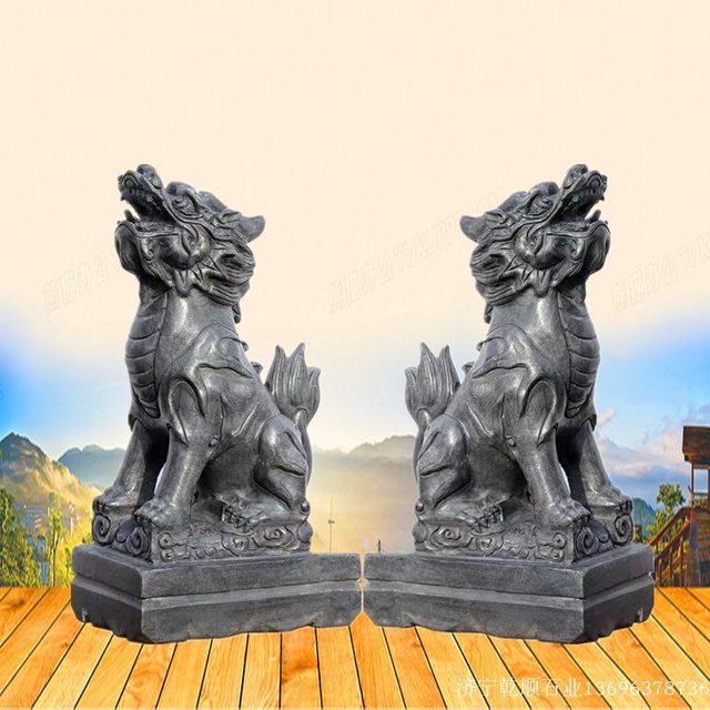 Stone carving bluestone looking at the sky and roaring mythical beast ...