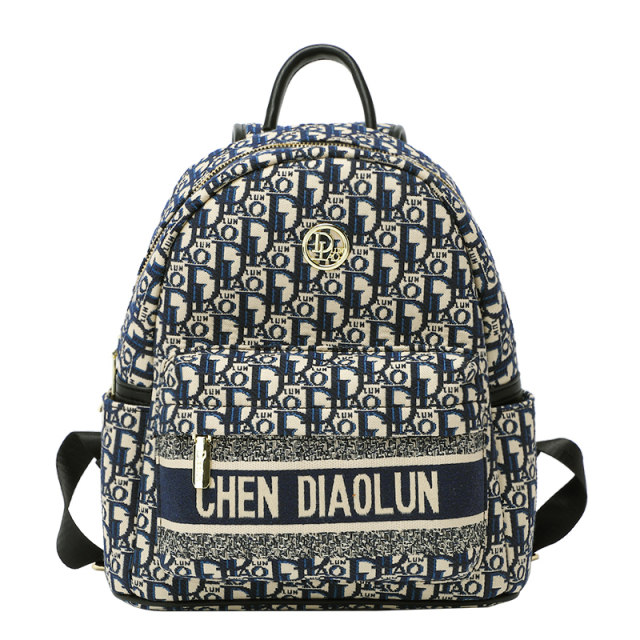 High-end large-capacity commuter genuine leather embroidered backpack ...