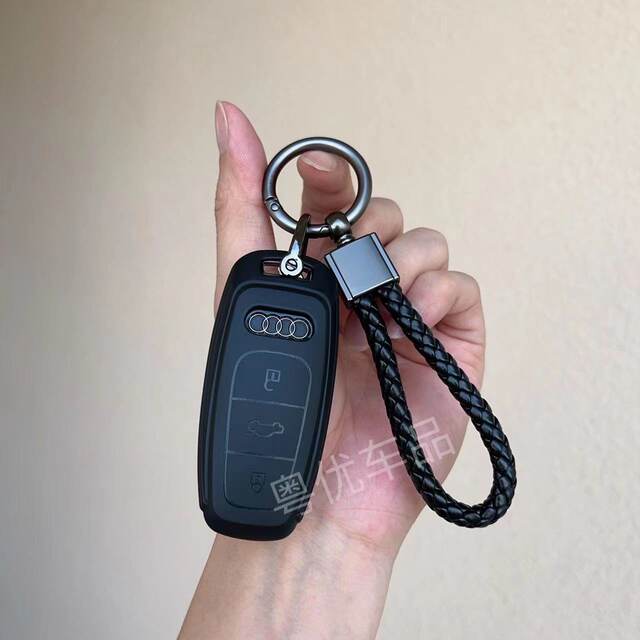 Suitable for Audi a6l key cover q5l/a4l/a3/a7l/q3/q2l/q4/q6/a8/q7 car bag shell buckle