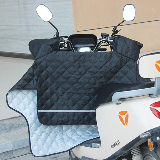 Electric car windshield is covered by summer sun protection thin ...